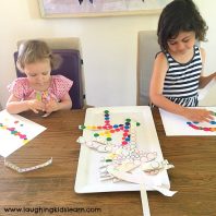 Kids playing and learning with stickers for fun and fine motor ...